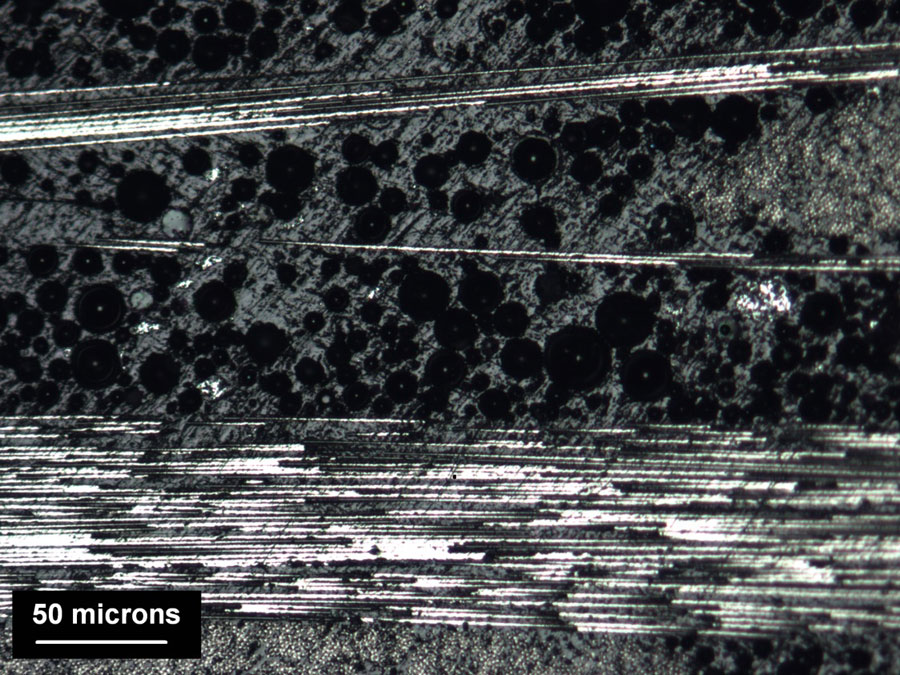 Impact damage and CAI strength of a woven CFRP material with fire ...
