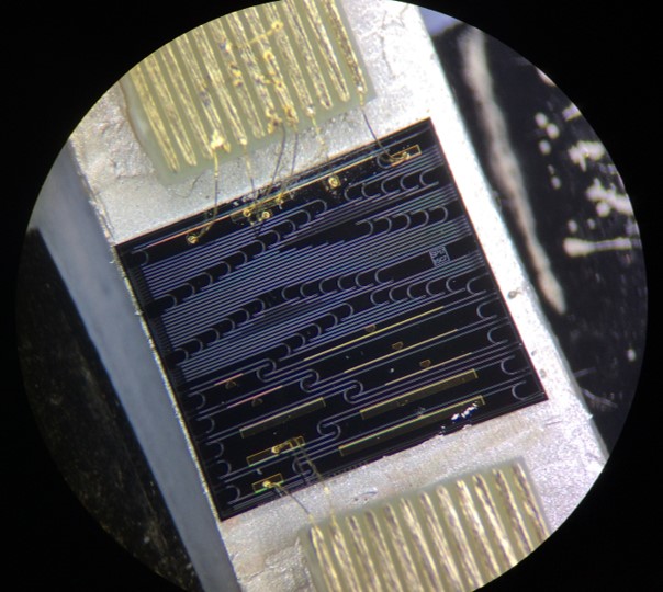 1.8-THz-wide optical frequency comb emitted from monolithic passively ...