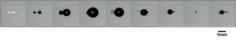 Laser-induced bubble formation on a micro gold particle levitated in ...